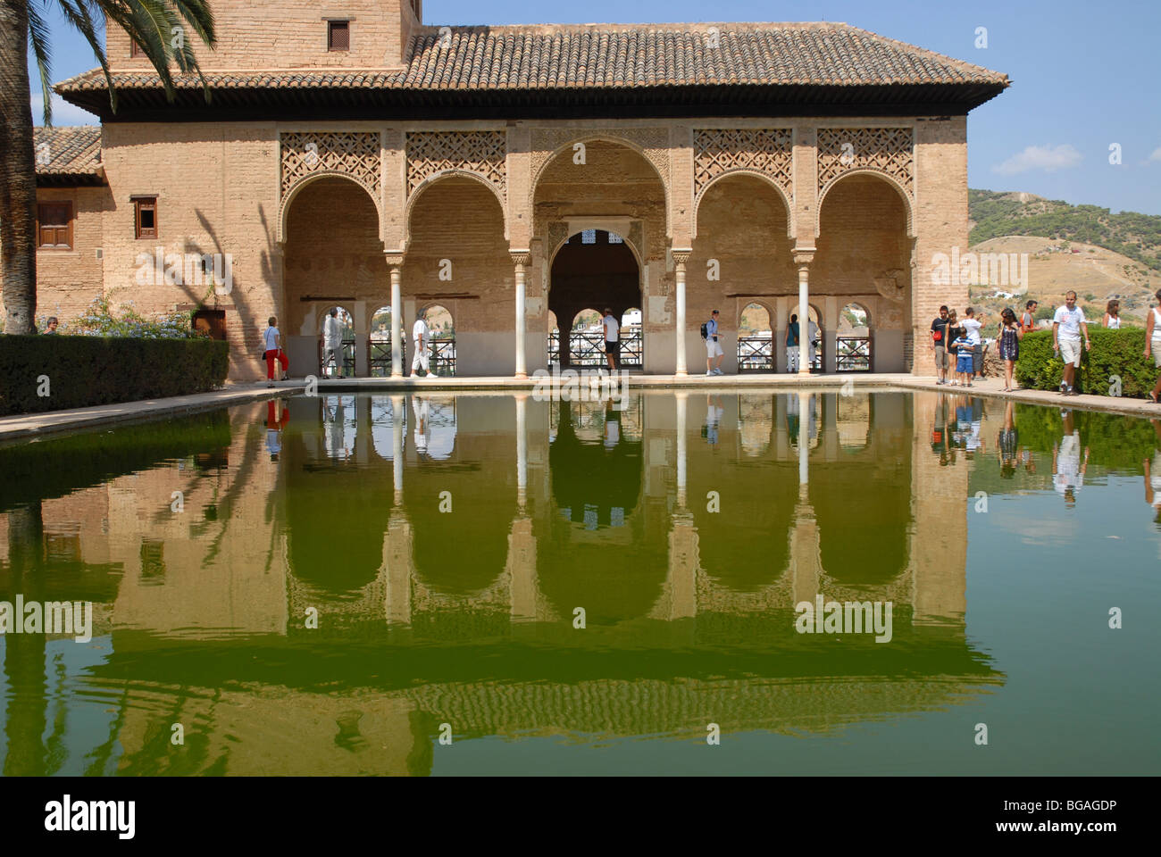 visitors at the open portico of Torre de las Damas, Tower of The Ladies ...