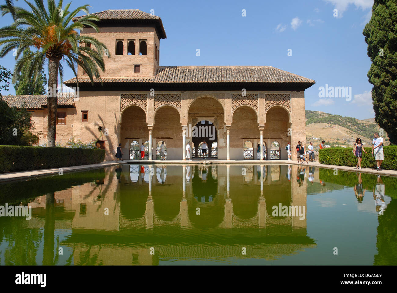 visitors at the open portico of Torre de las Damas, Tower of The Ladies ...
