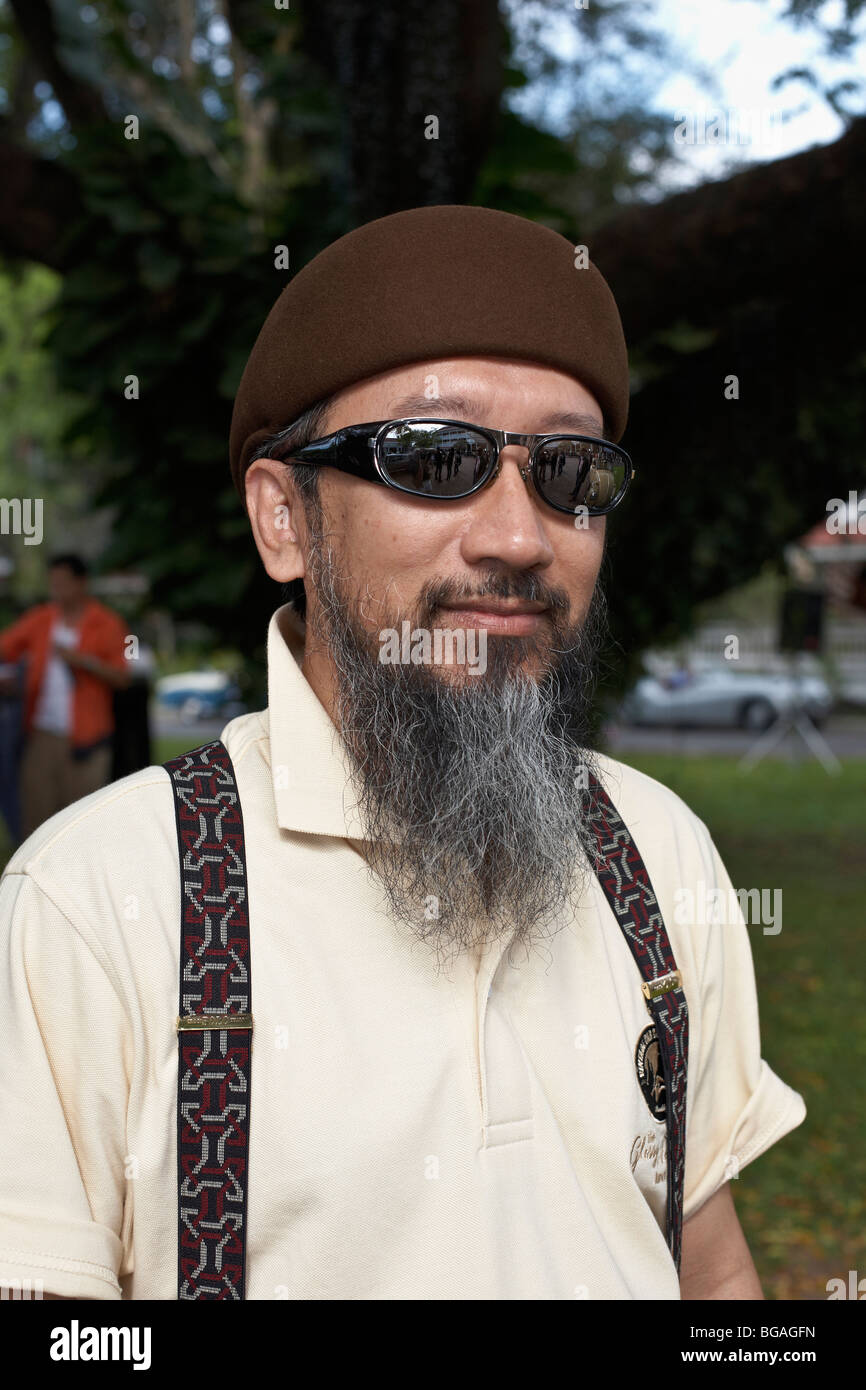 Asian man with beard, beret and sunglasses. Thailand S. E. Asia Stock ...