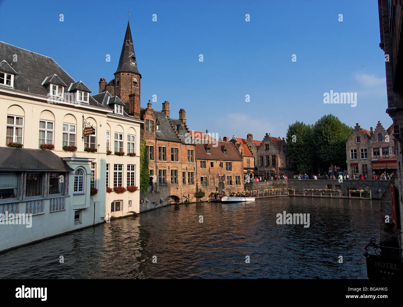 flanders city bruges brugge belgium ancient houses canal sky blue boat ...