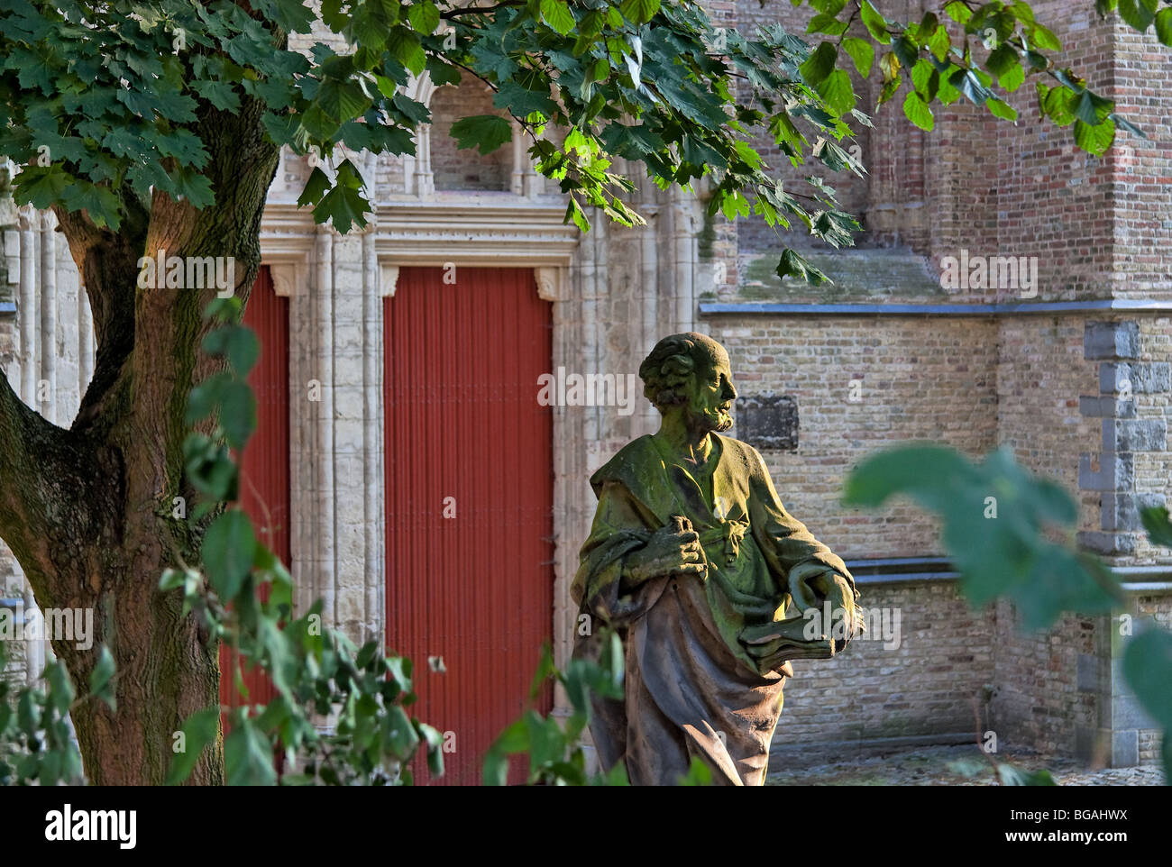 flanders city bruges brugge belgium ancient houses statue tree monument ...