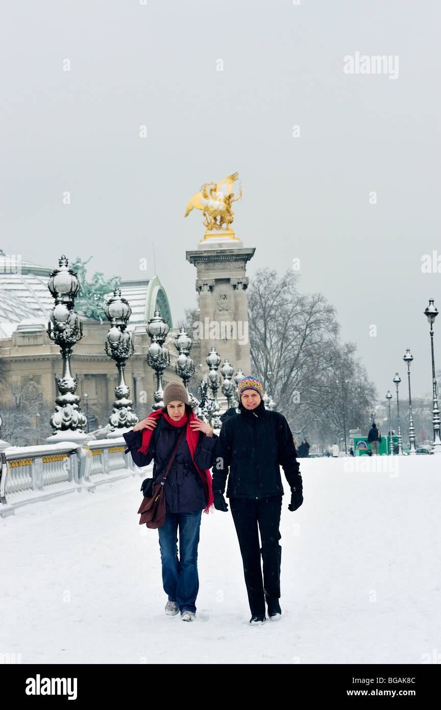 Paris, France, Winter Snow Storm, Two Persons, Women Walking on "Pont ...