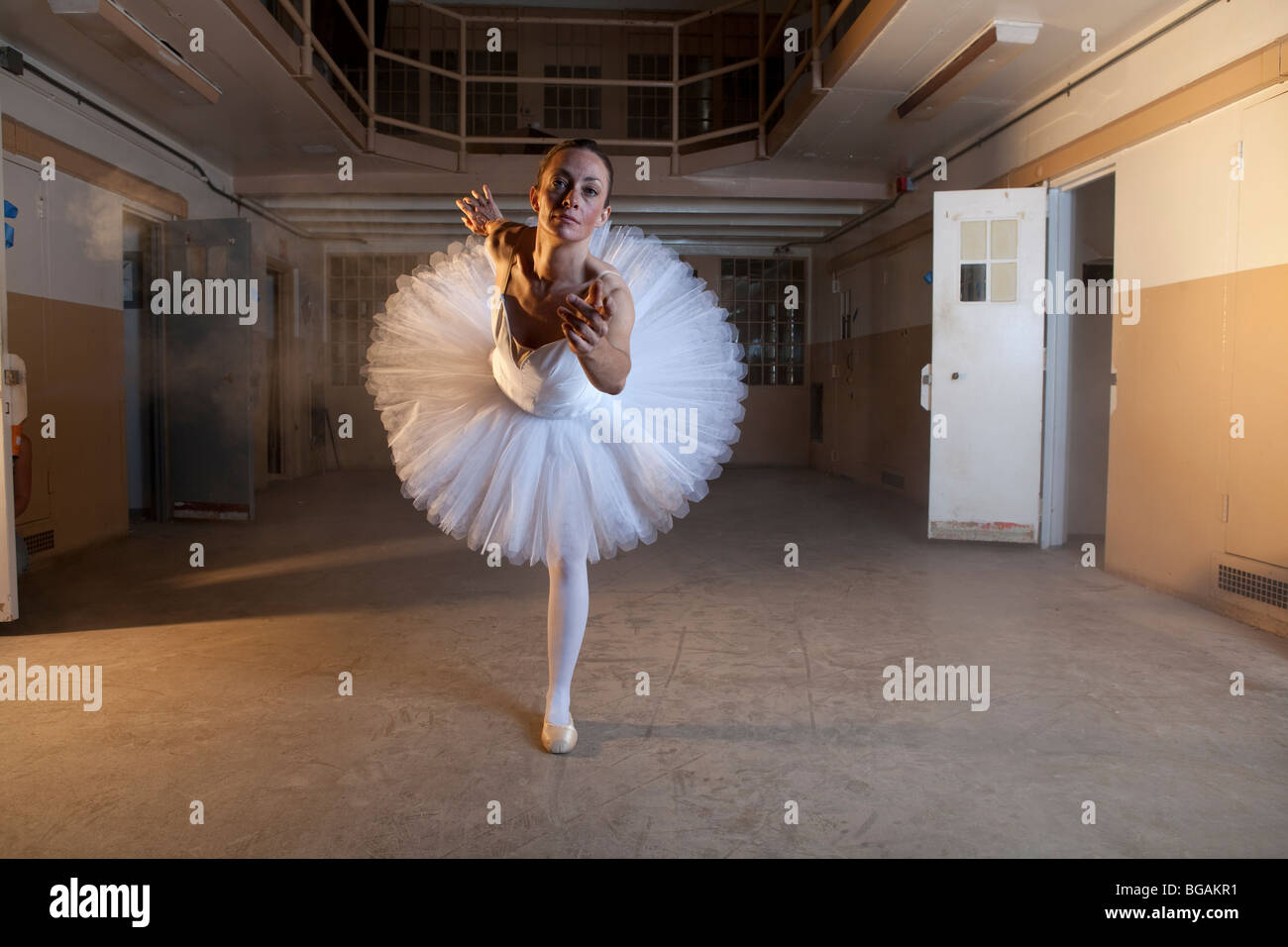 A dancer in a tutu inside a prison cell block Stock Photo - Alamy