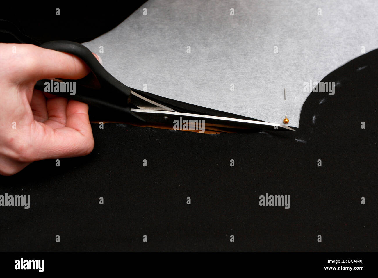 close up of cloth being cut with scissors for a sewing project Stock ...