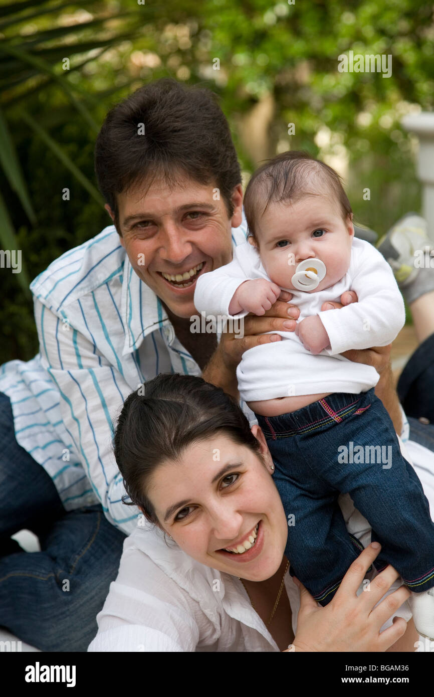 young family with baby Stock Photo - Alamy