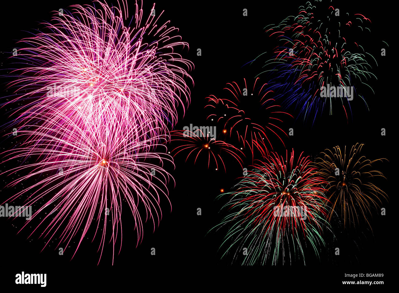 Fireworks exploding on new years eve, very colorful Stock Photo - Alamy