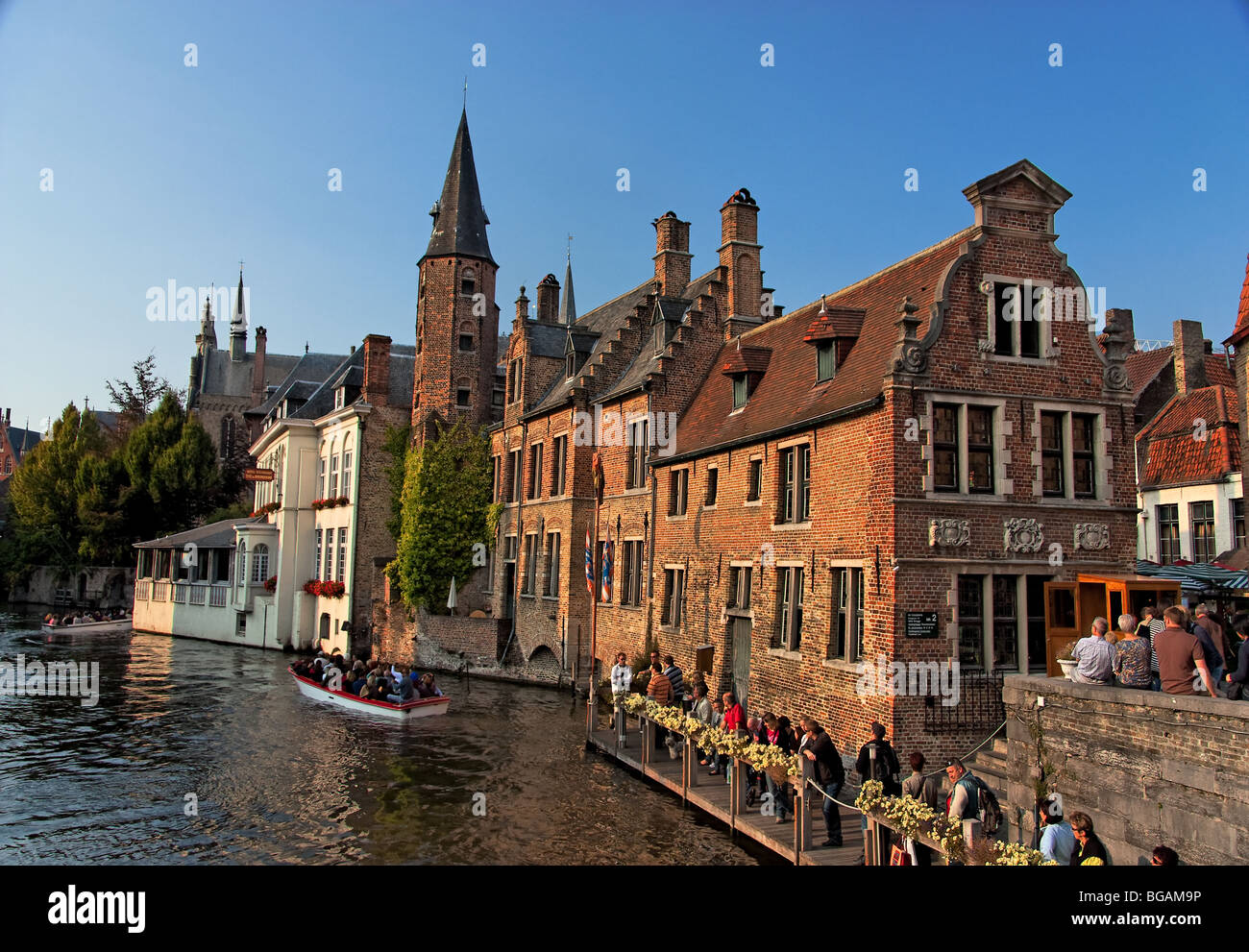 flanders city bruges brugge belgium ancient houses canal boat people ...