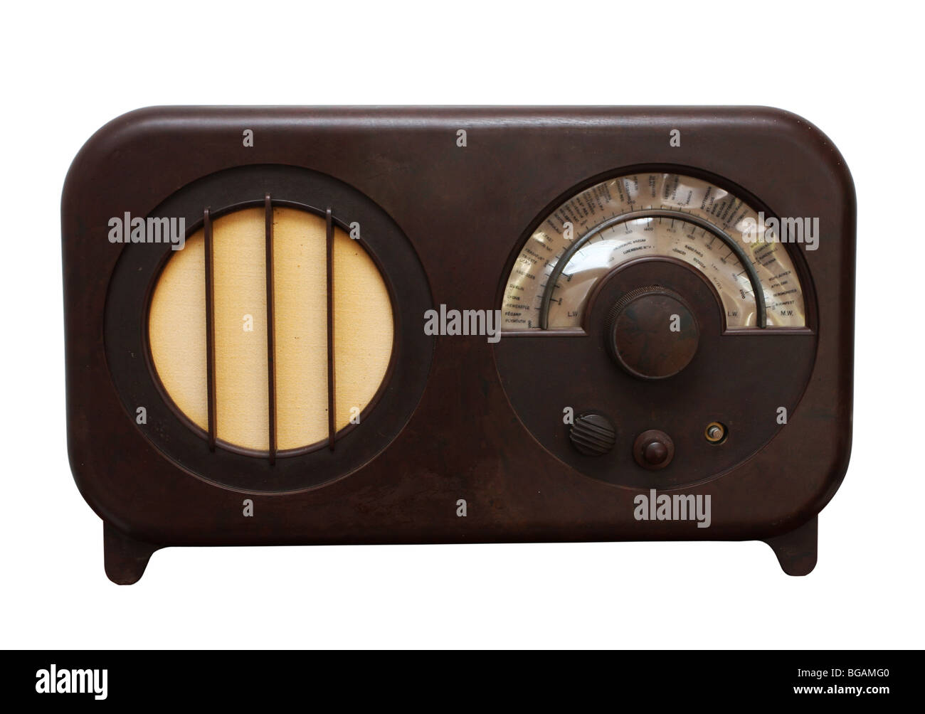 A very old and worn vintage radio isolated on white with clipping path ...