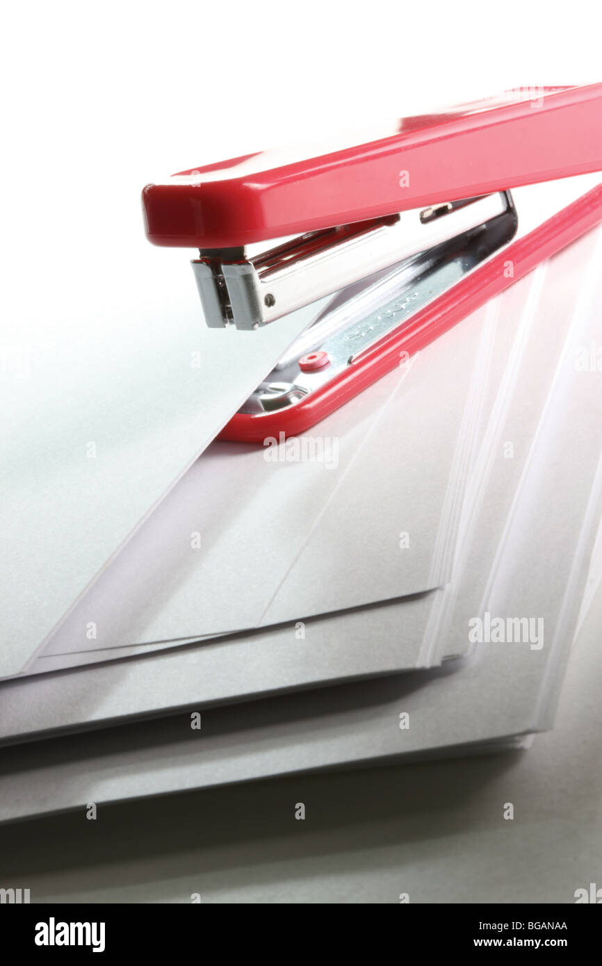 Stapler and paper Stock Photo - Alamy