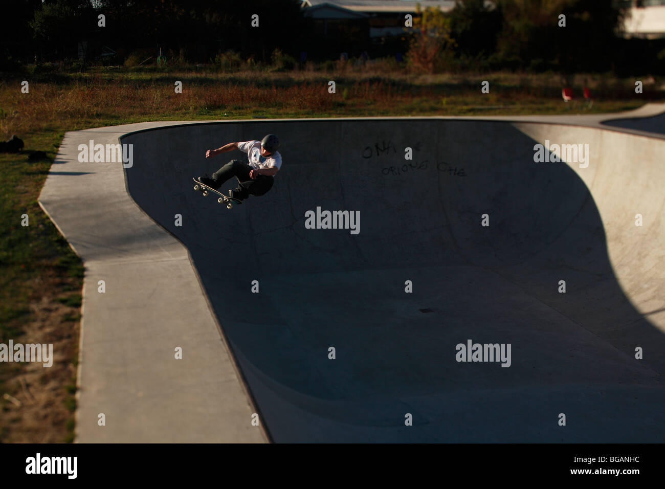 Skateboarder Peter Dossett does a frontside smith grind at Dreamlands ...