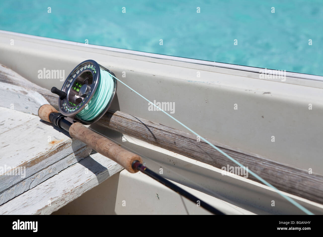 Still life of a fly rod in a boat Stock Photo - Alamy