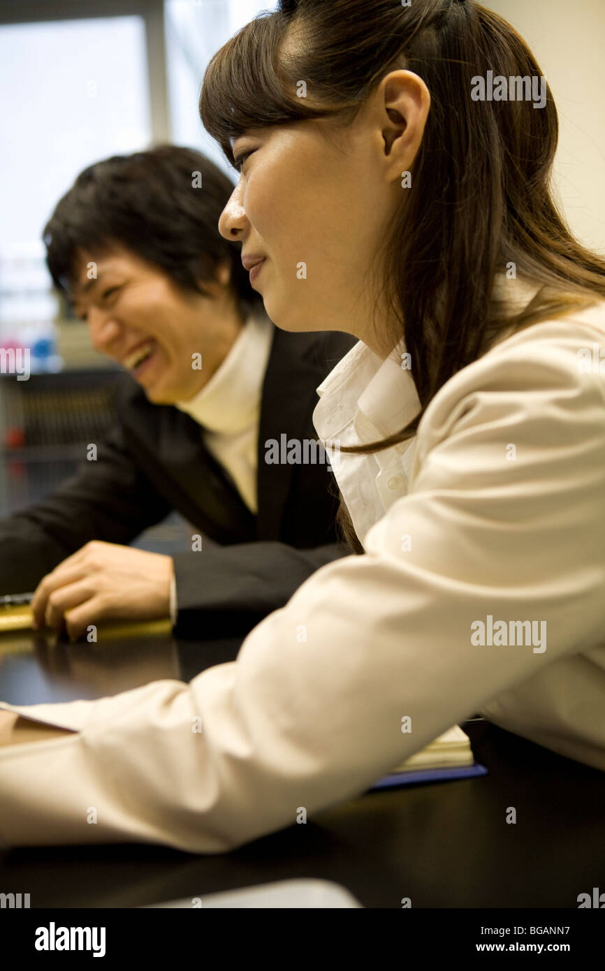 Two people meeting at table Stock Photo - Alamy