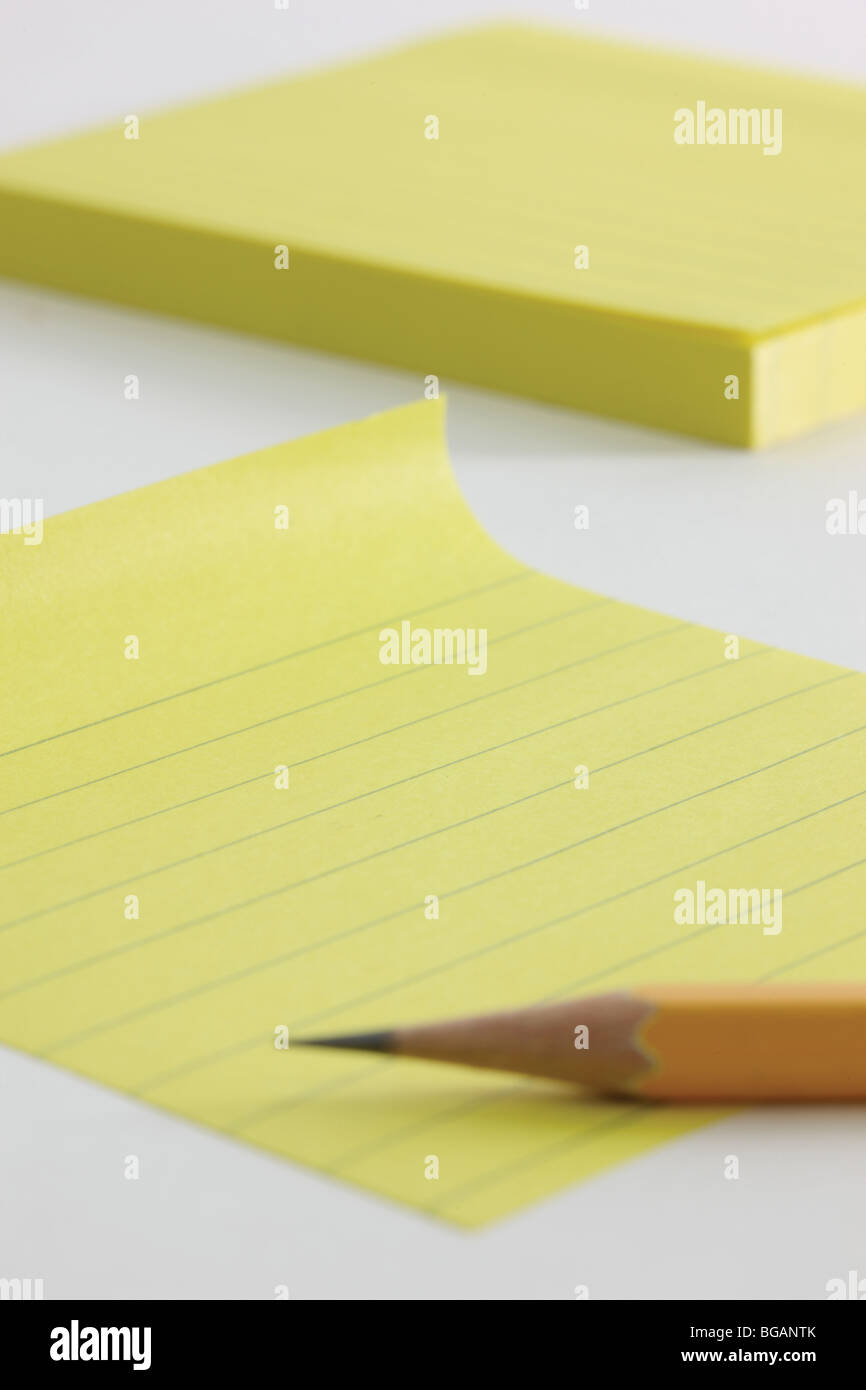 Adhesive notes with pencil Stock Photo - Alamy