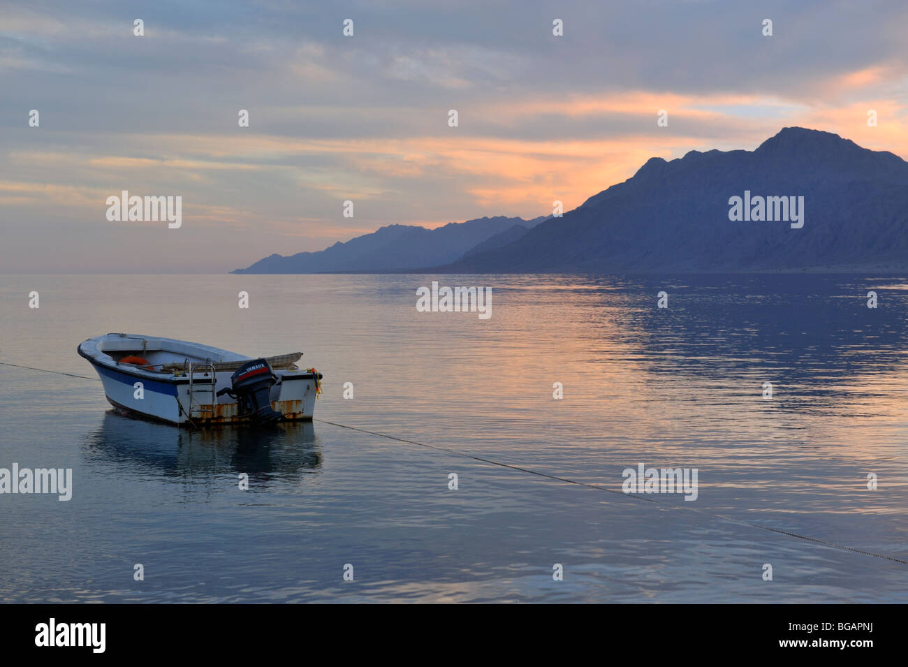 Scenic "Red Sea" sea with small boat and mountains, Nuweiba, Sinai ...