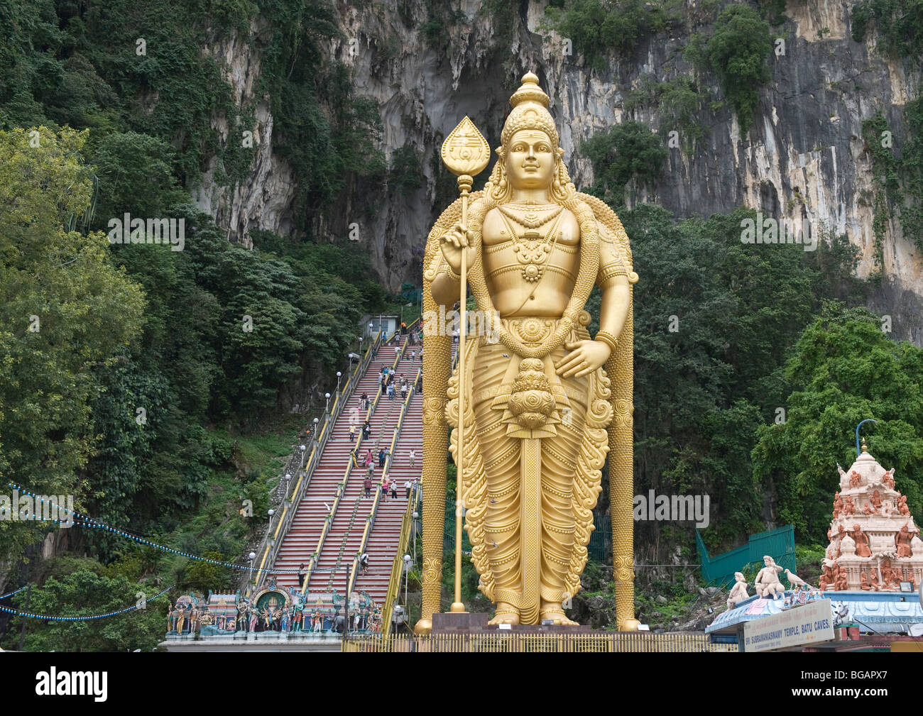 Mammoth golden statue of Hindu God Murugan at the entrance of sacred ...