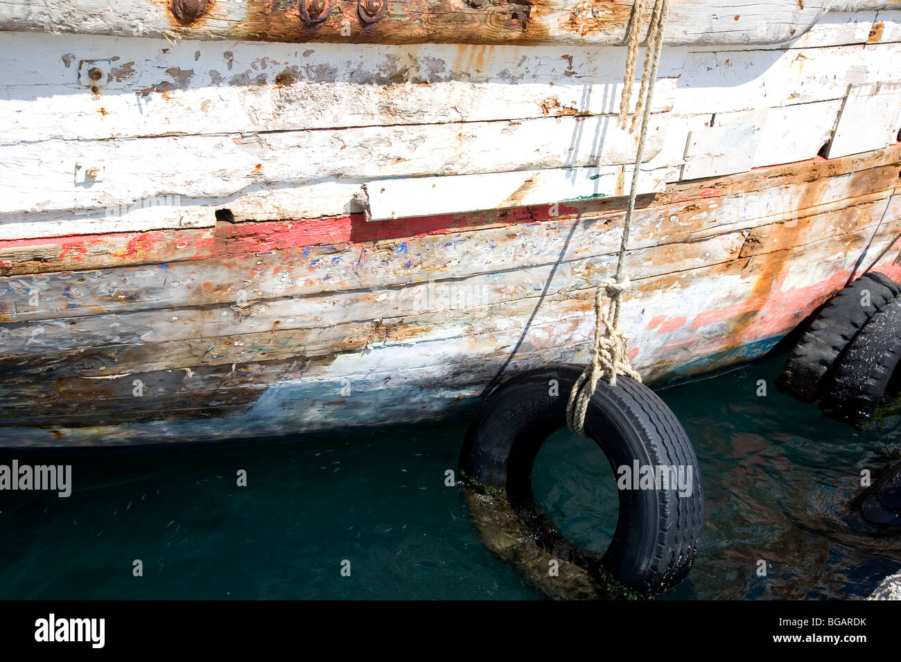 Texture and weathered paint on Wooden hull of boat Stock Photo - Alamy