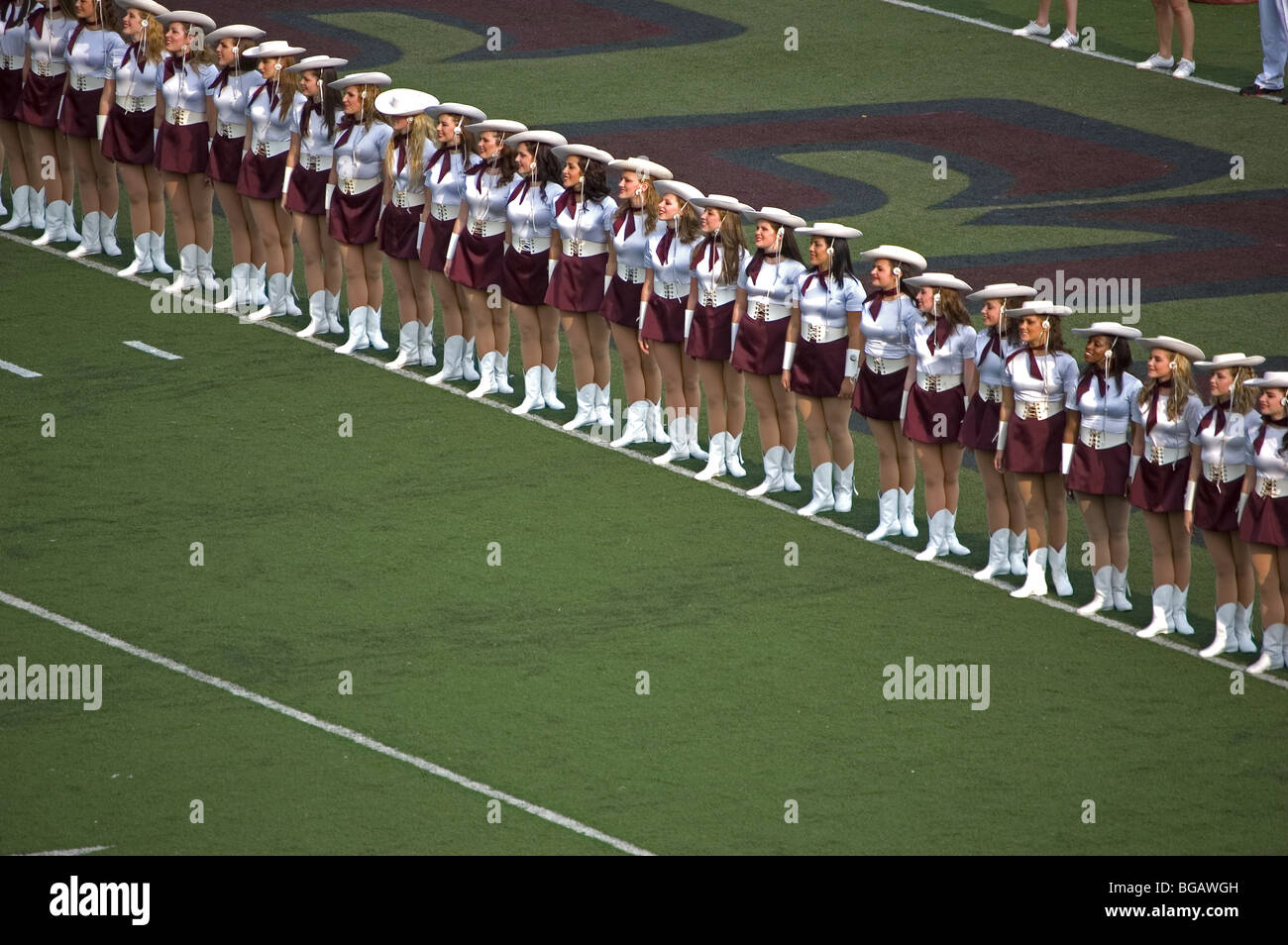 Dance squad on the football field getting ready to perform during game ...