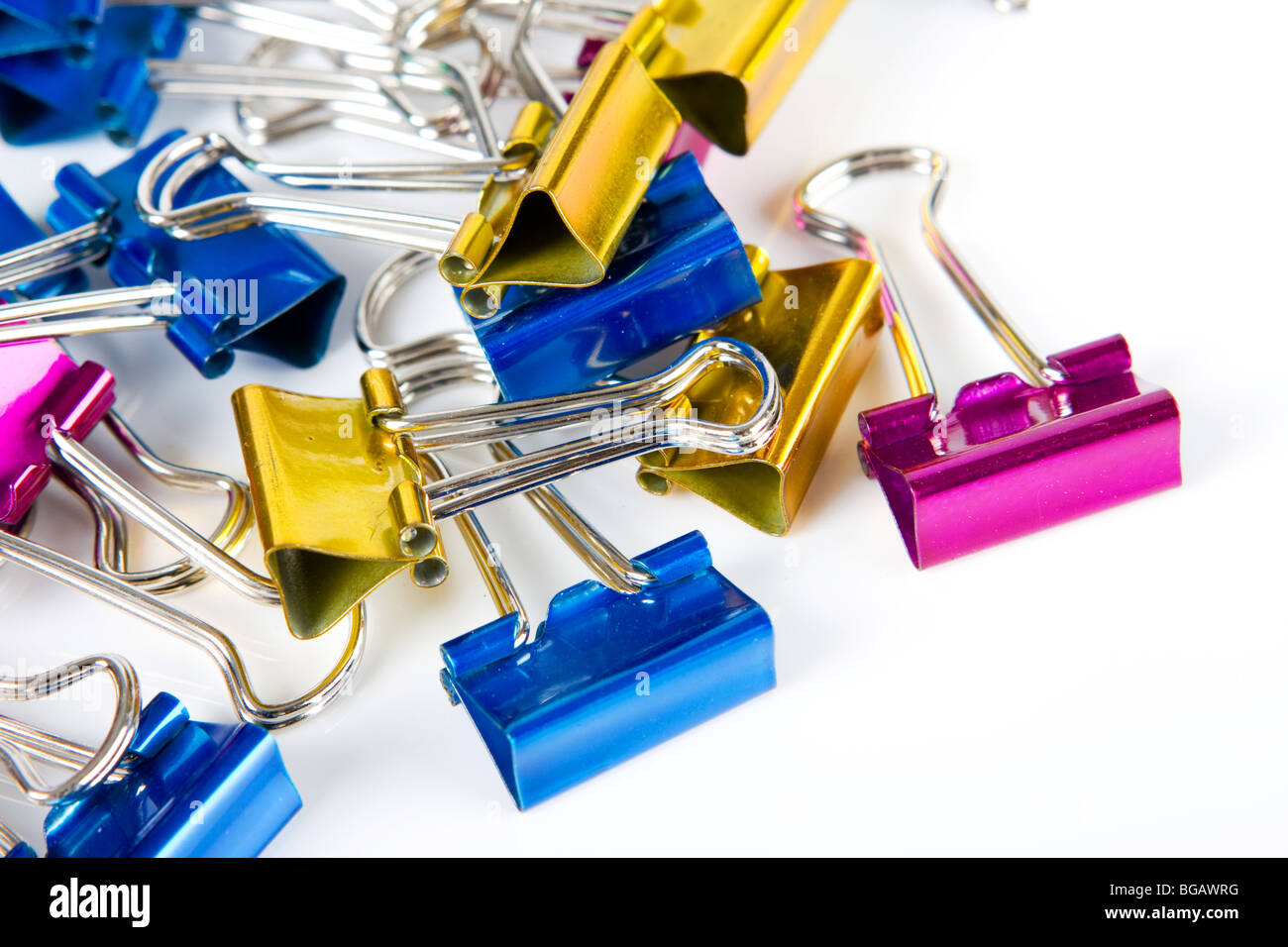 Pile of colorful paperclips isolated on white, perfect for use in ...