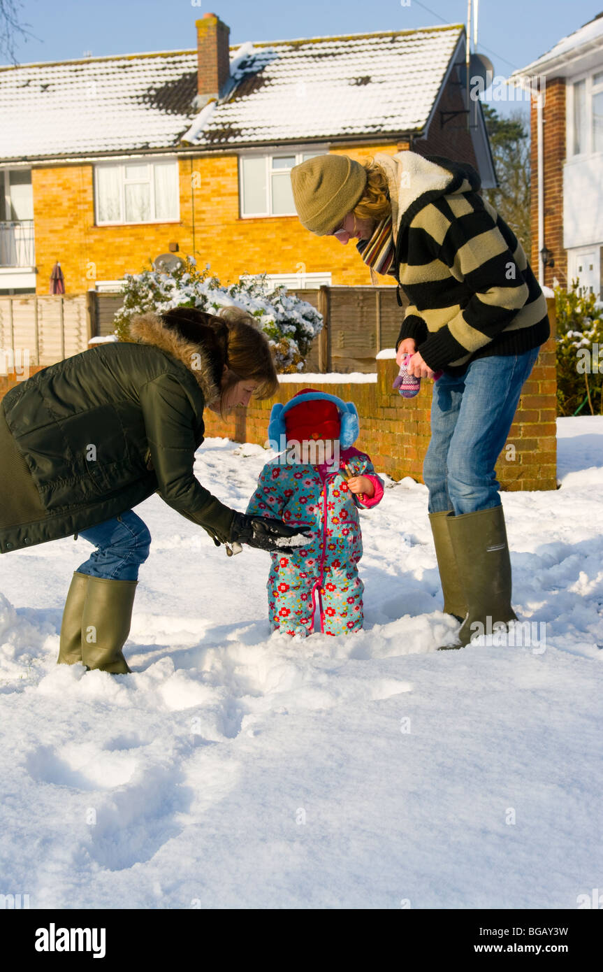 Grandmother Son and Granddaughter In The Snow Stock Photo - Alamy