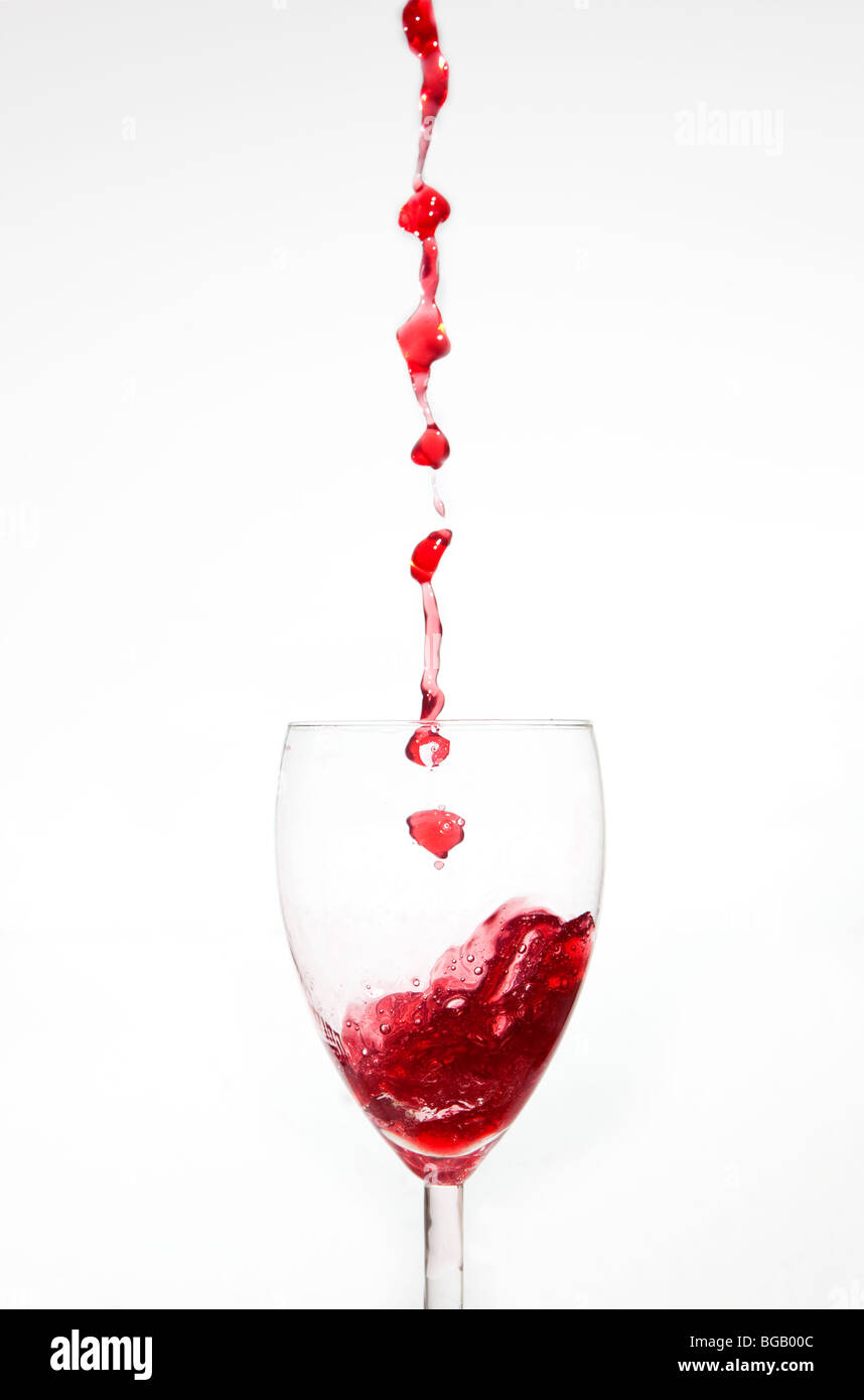 Wine falling into glass hi-res stock photography and images - Alamy