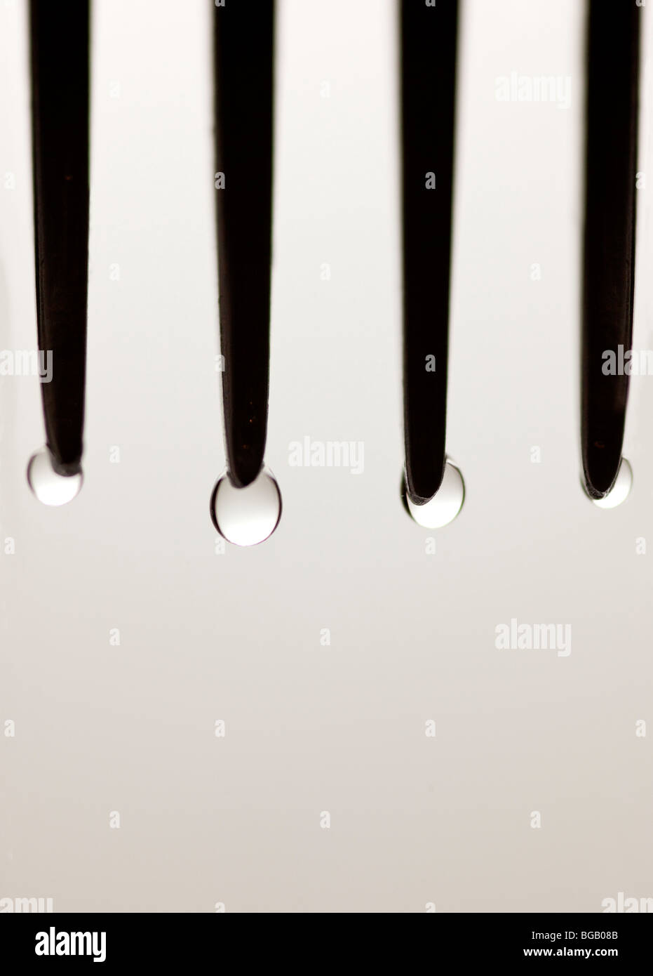 Drops of water on fork - black and white Stock Photo - Alamy