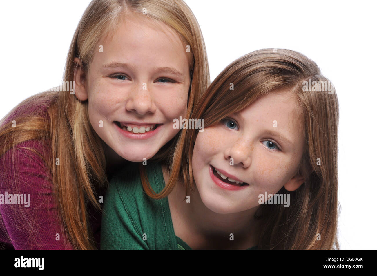 Two sisters smiling isolated on hi-res stock photography and images - Alamy