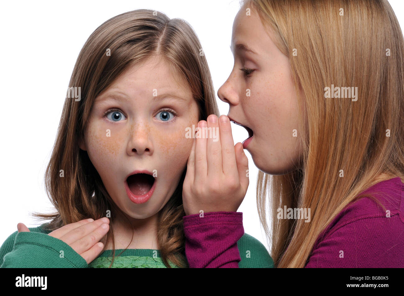 Children telling secrets hi-res stock photography and images - Alamy