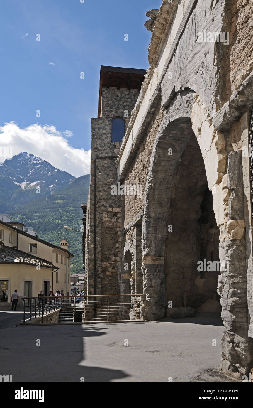 Pretoria or Praetorian Roman gate gateway arch with snow peaks of ...