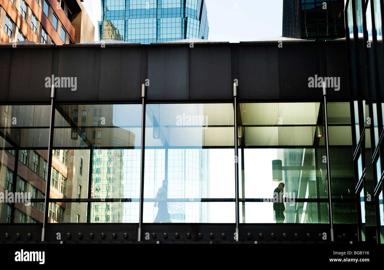 elevated walkway w/businessman on phone Stock Photo - Alamy