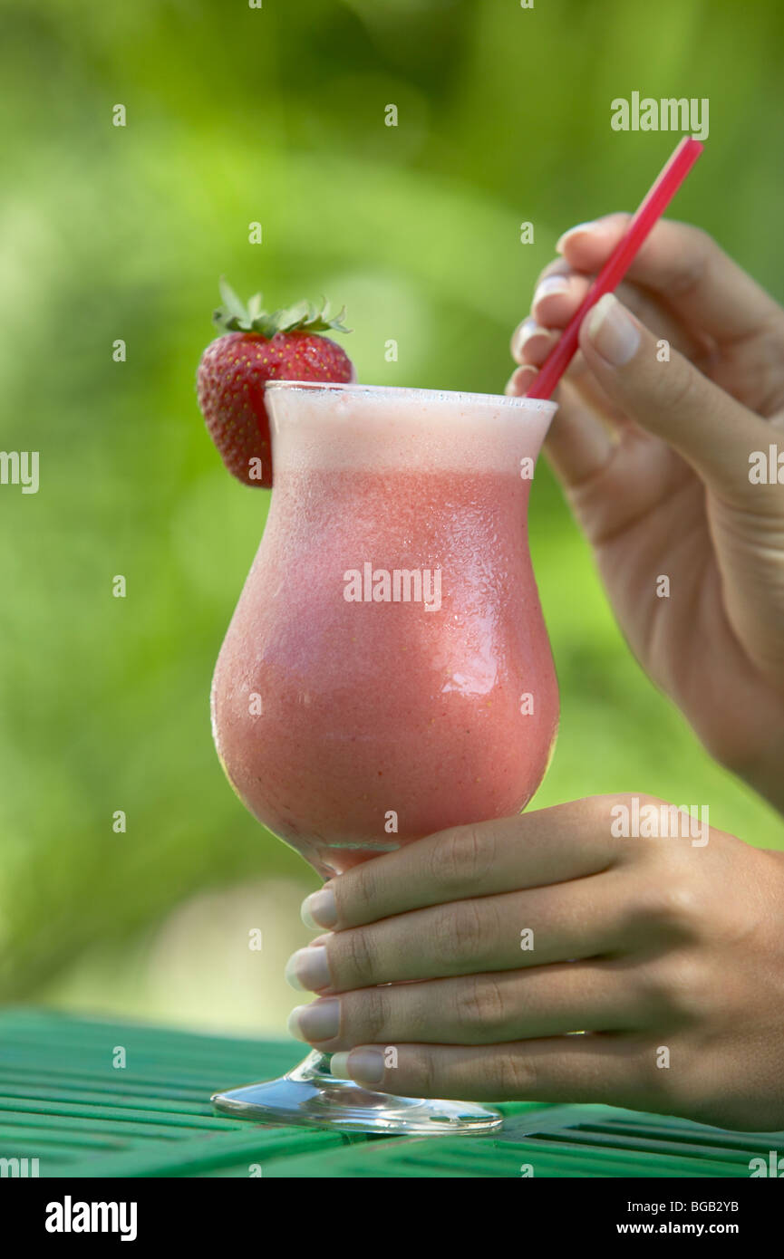 Female hand holding cocktail hi-res stock photography and images - Alamy