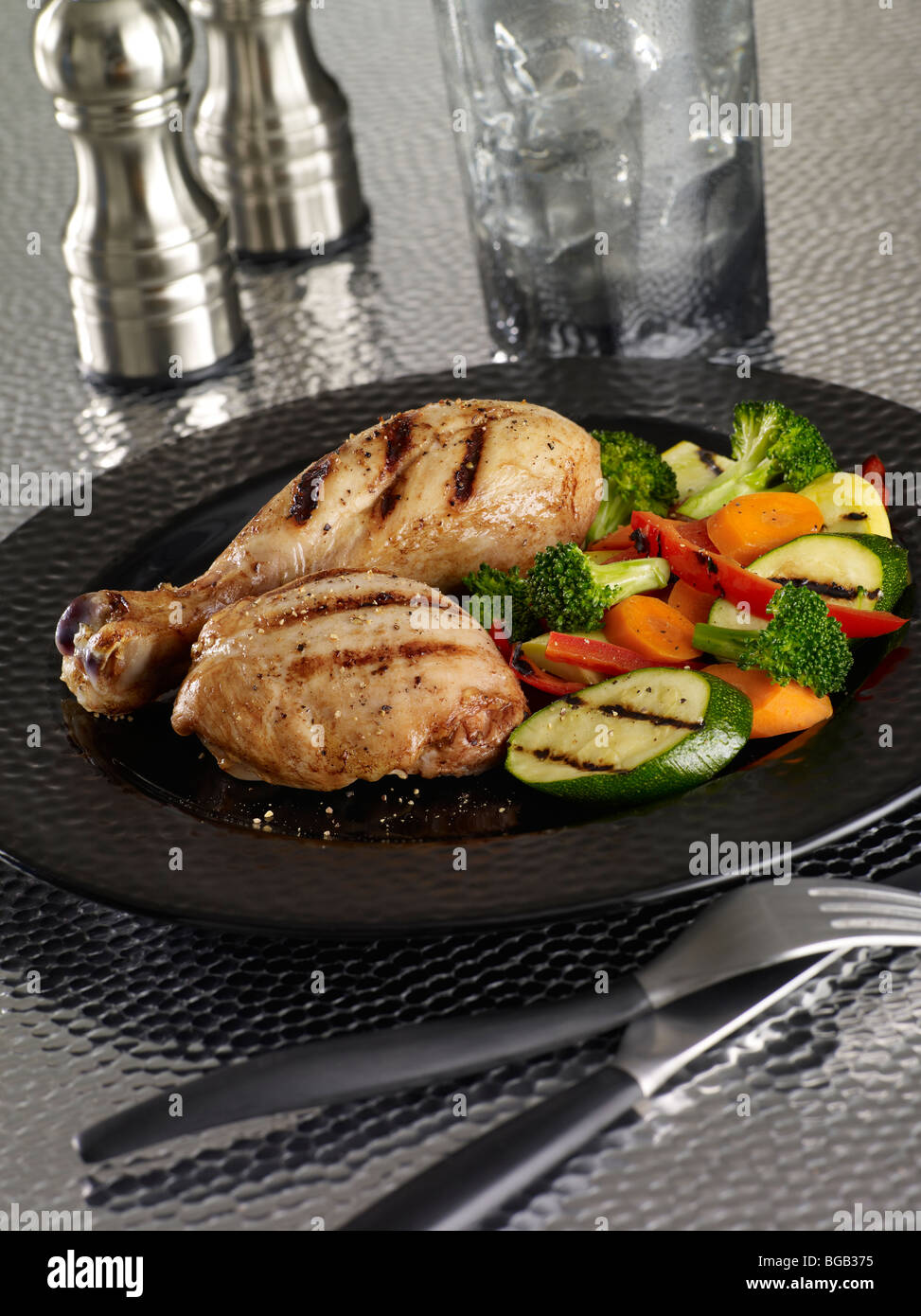 Grilled skinless chicken with vegetables Stock Photo - Alamy