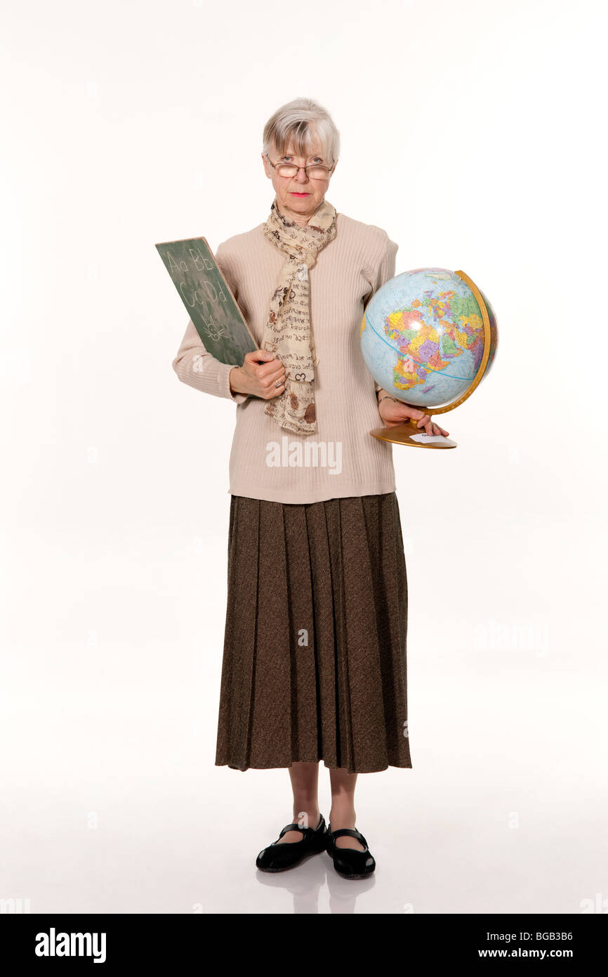 A stern teacher peers over the top of her glasses Stock Photo - Alamy