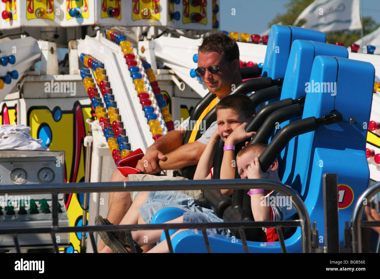 Father and Sons on Carnival Ride named Mega Bounce. Canfield Fair ...
