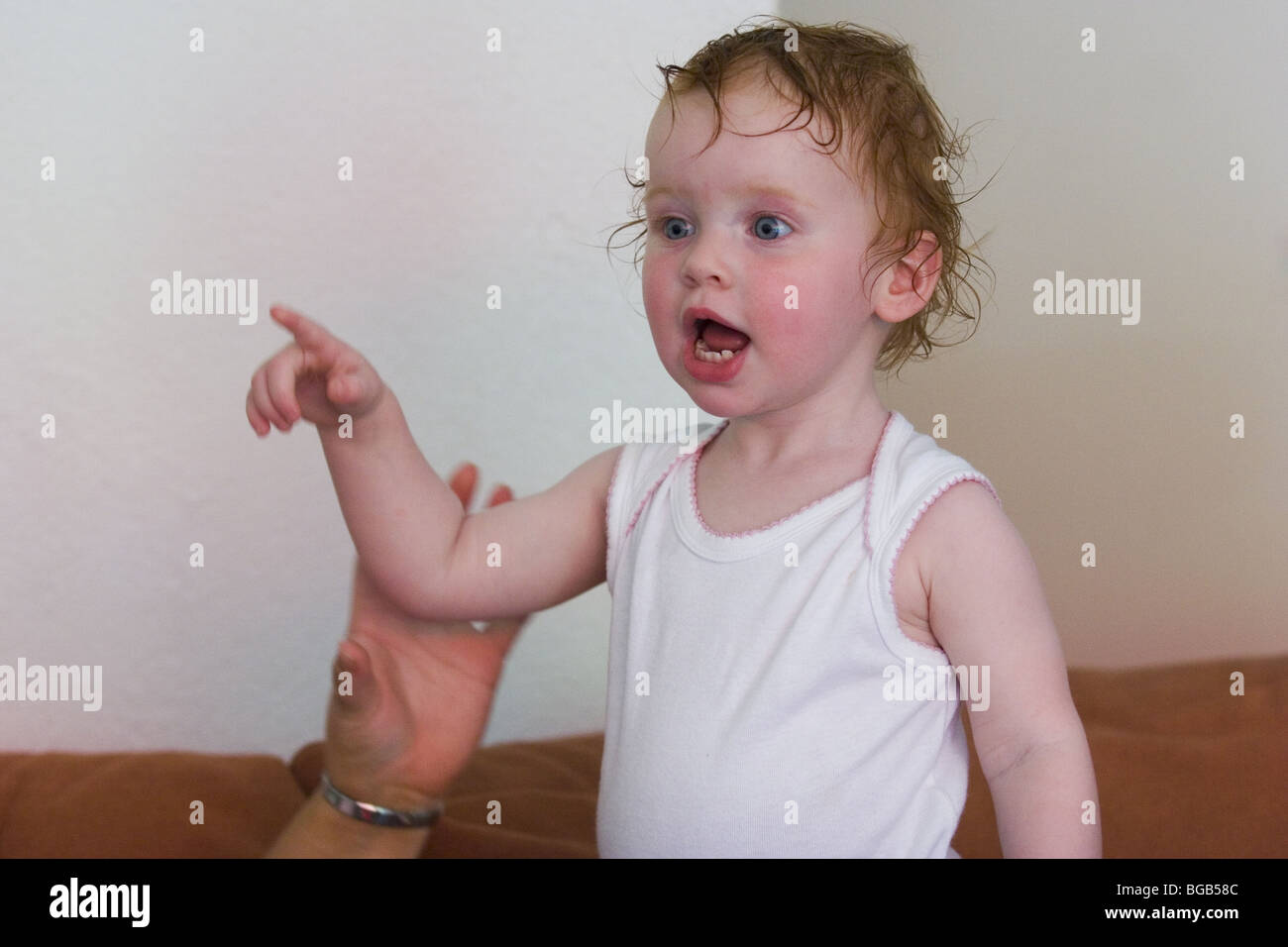 Baby child pointing and talking baby communication Stock Photo - Alamy
