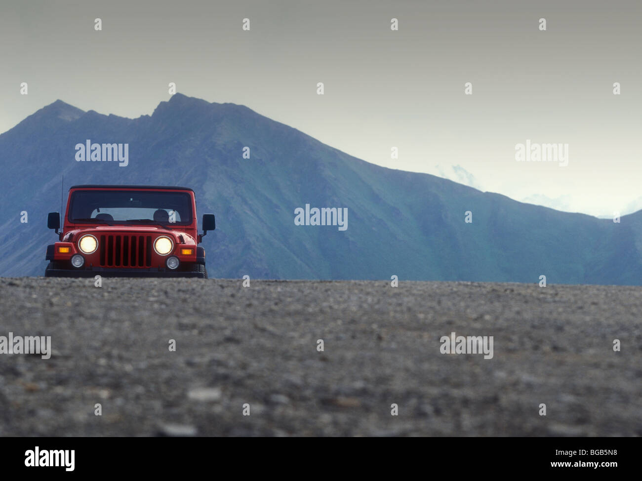 Jeep Wrangler driving in the mountains in Alaska USA Stock Photo - Alamy