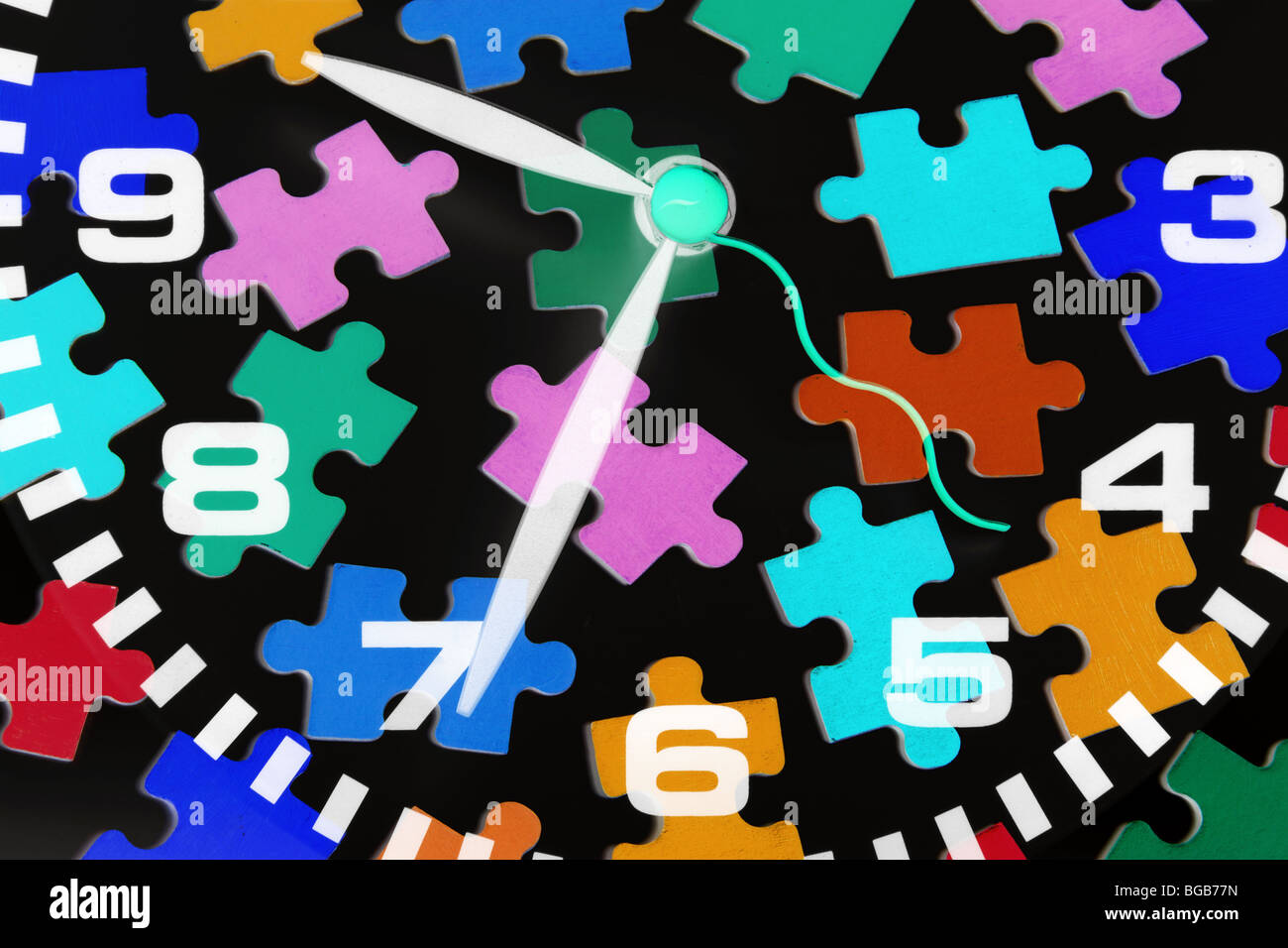 Clock and Jigsaw Puzzle Pieces Stock Photo - Alamy