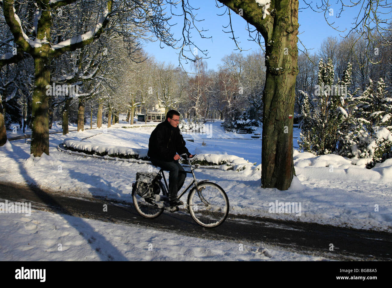Biking through snow hi-res stock photography and images - Alamy