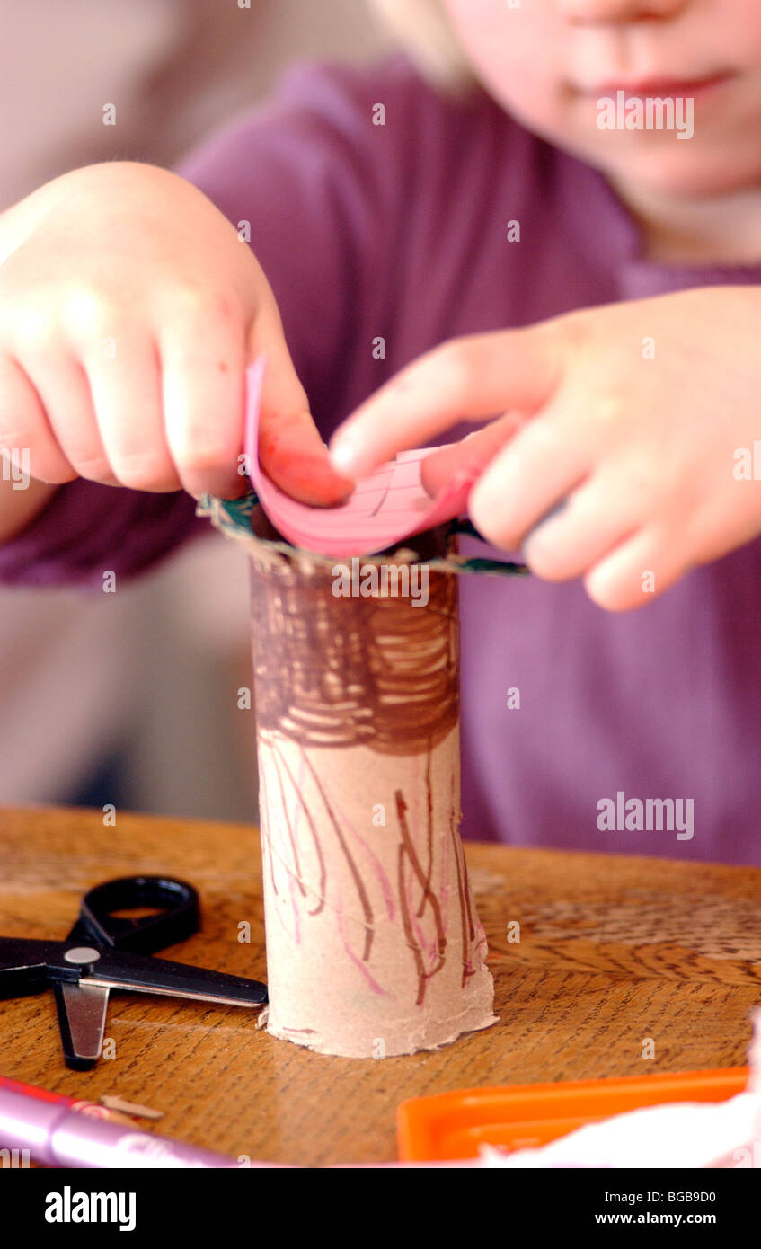 Royalty free photograph of child girl enjoying arts and crafts lesson ...