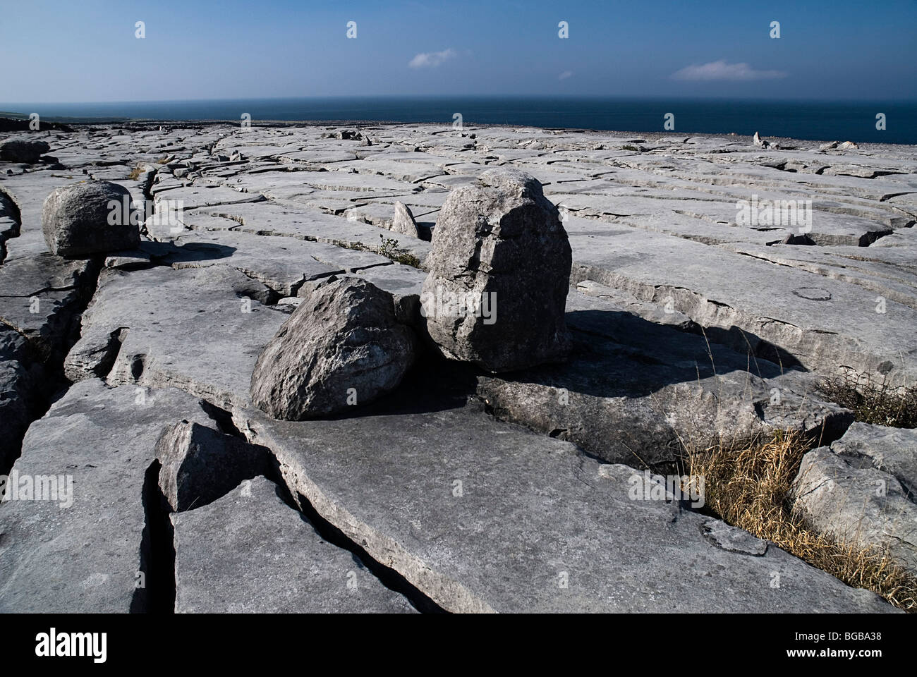 Ireland, County Clare, The Burren, boulders on limestone pavement ...