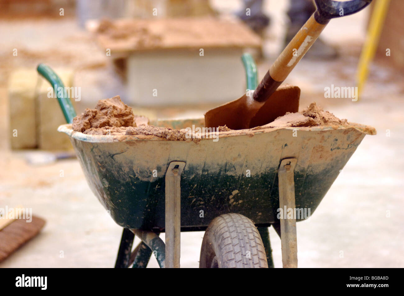 Royalty free photograph of building site wheel barrow full of mortar ...
