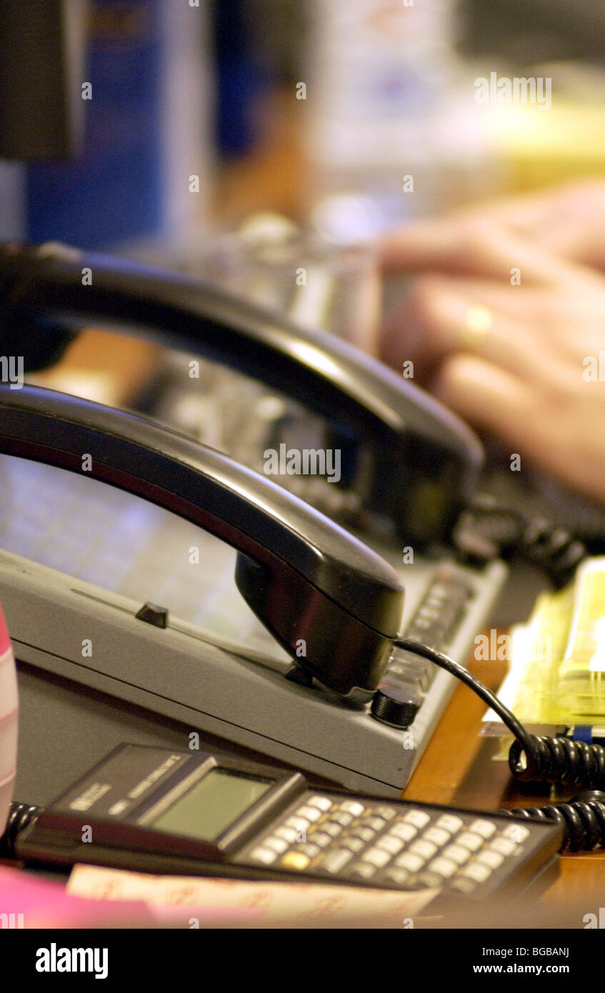 Photograph of trader the city desk business phones busy waiting Stock ...