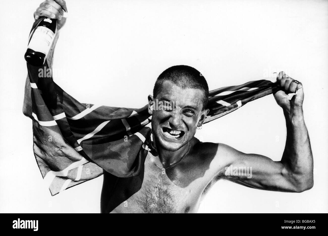 Royalty free photograph of football hooligan being aggressive and ...