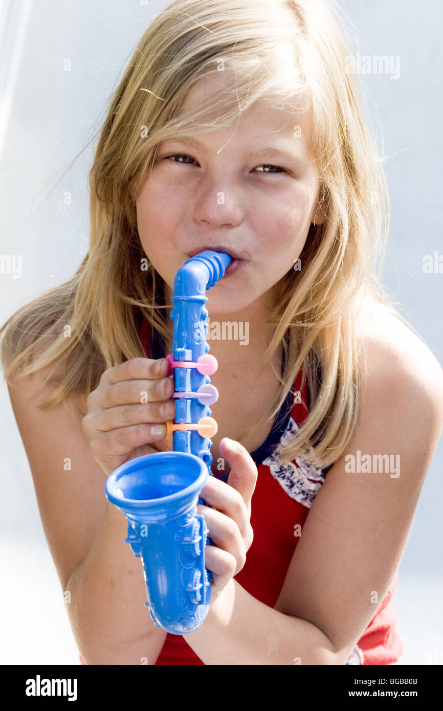Child plays flute hi-res stock photography and images - Alamy