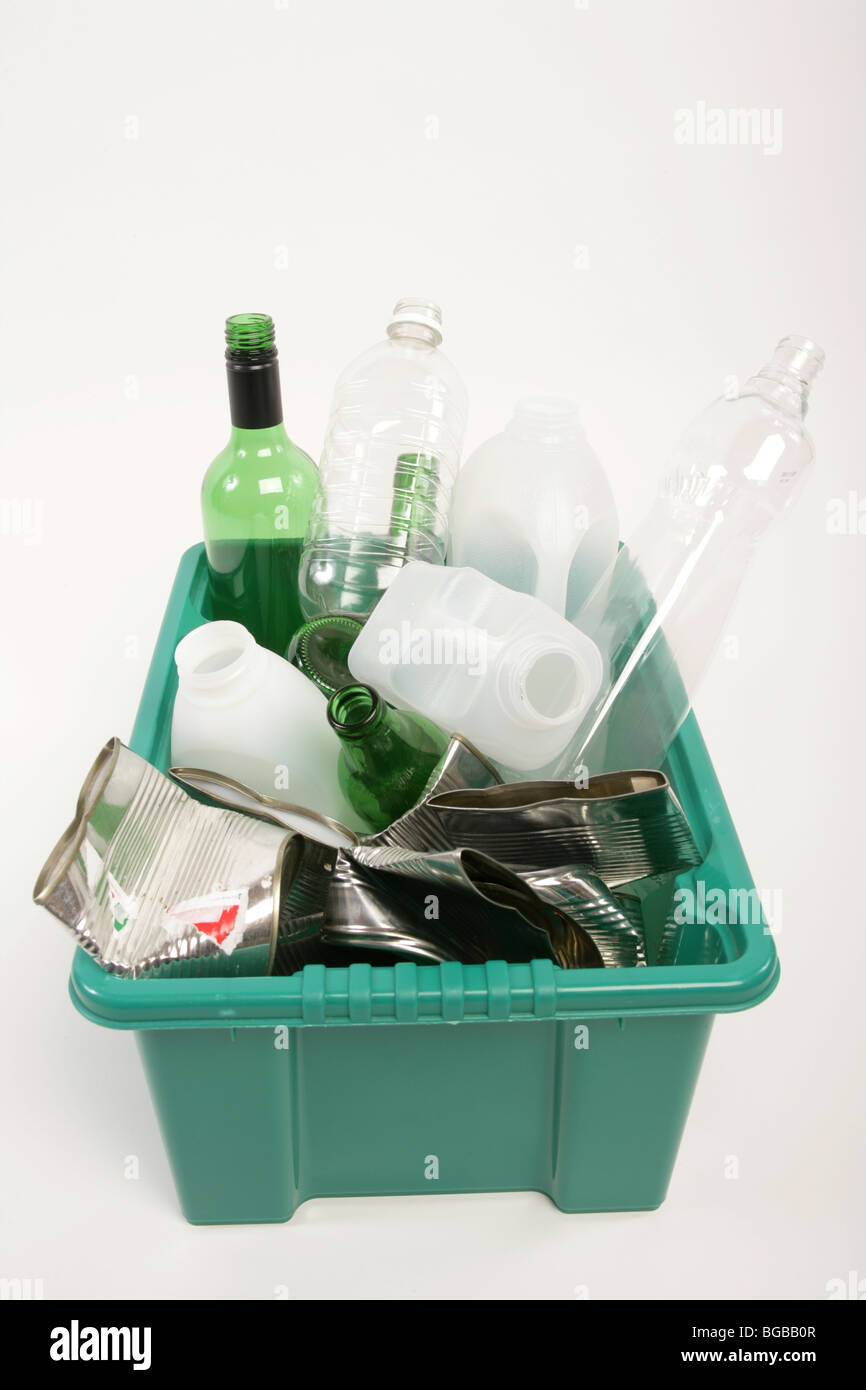 Plastic and glass bottles and tin cans in a plastic recycling box Stock ...