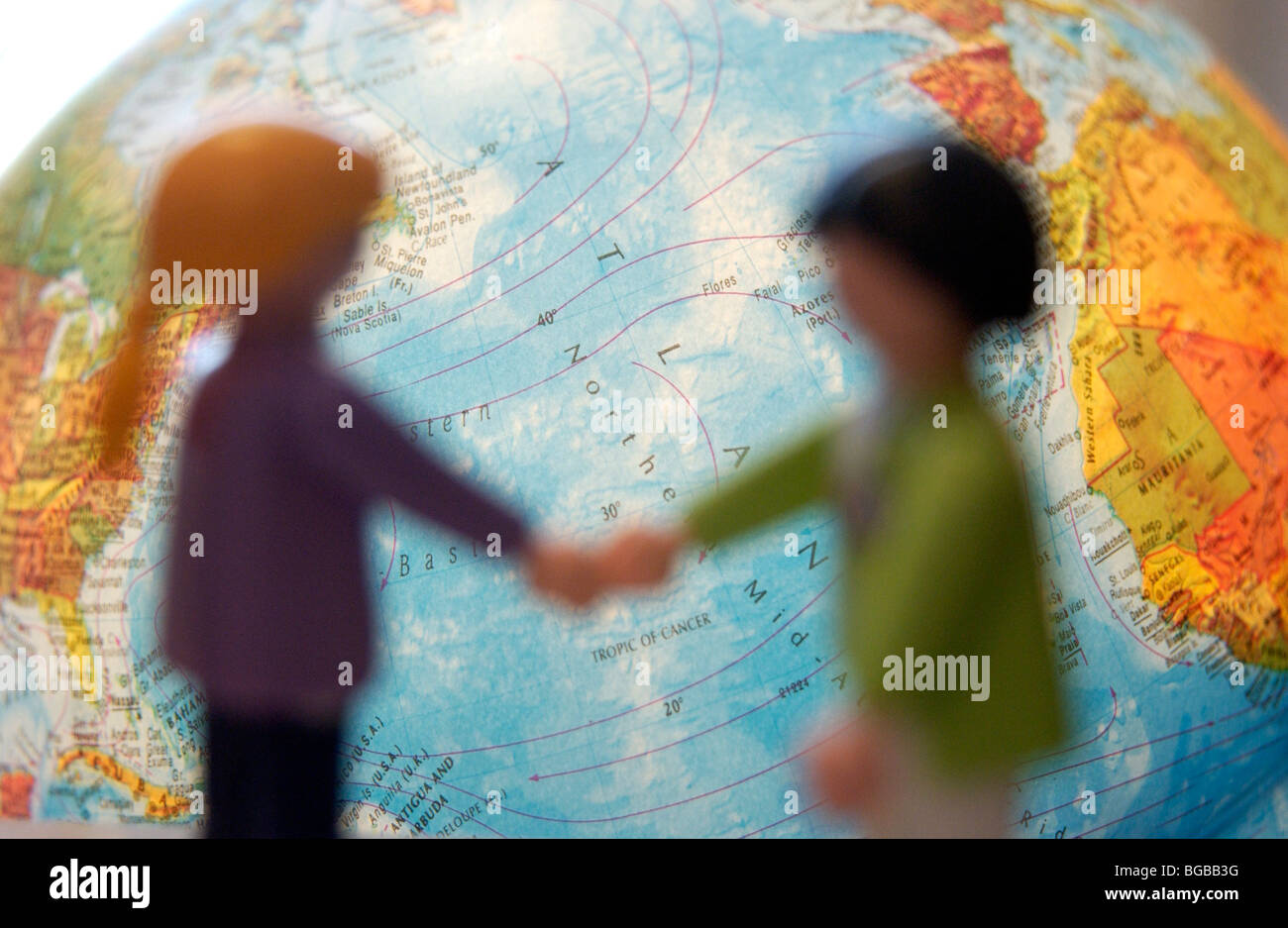 Royalty free photograph of friends holding and shaking hands with the ...