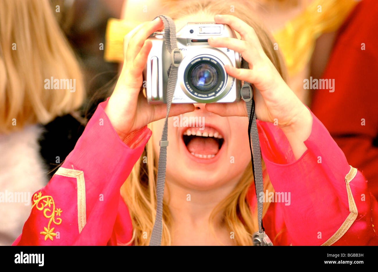 Photograph of kids taking pictures party photos girl children UK Stock ...