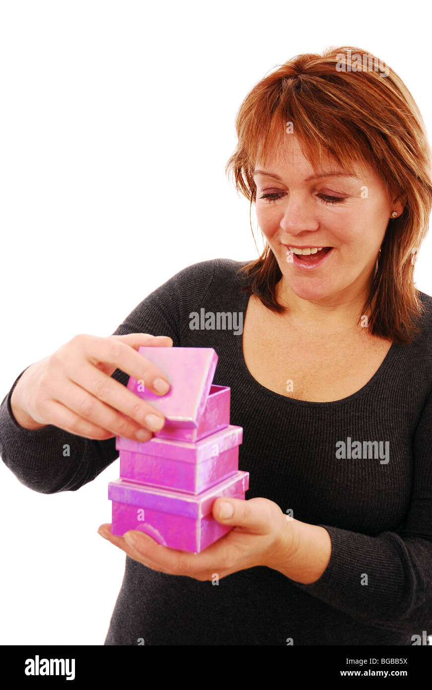Woman giving presents out hi-res stock photography and images - Alamy