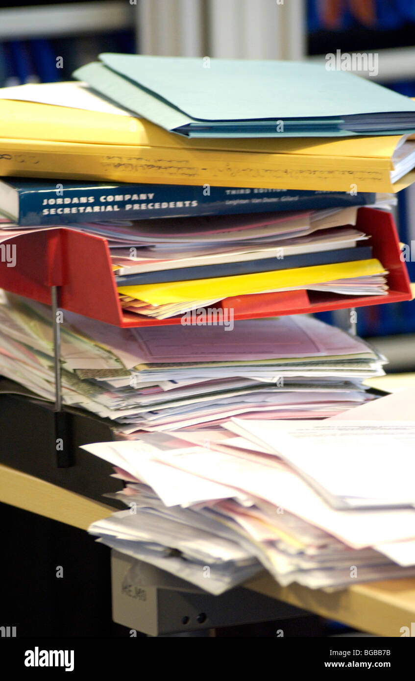 Royalty free photograph of busy office full of files and paperwork ...
