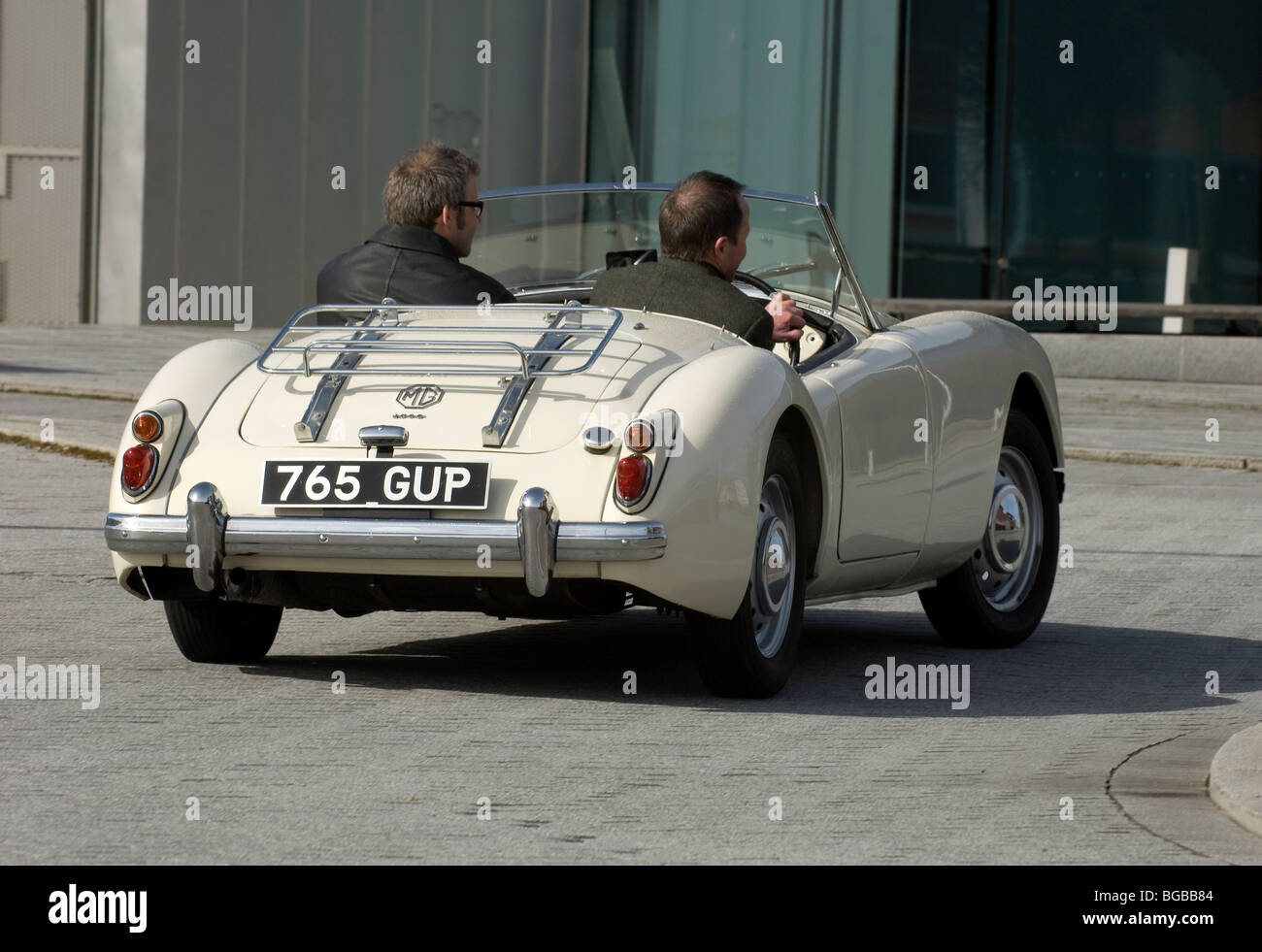 MGA classic English open sports car cornering Stock Photo - Alamy