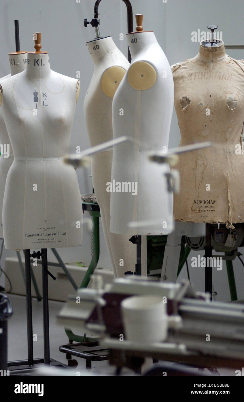 Royalty free photograph of dress makers dummy in fashion studio in ...